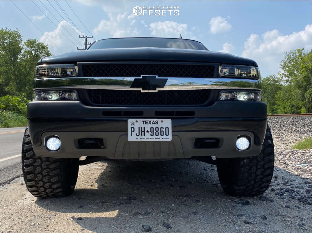 2003 Chevrolet Tahoe with 24x14 -76 TIS 544MB and 33/12.5R24 Suretrac ...
