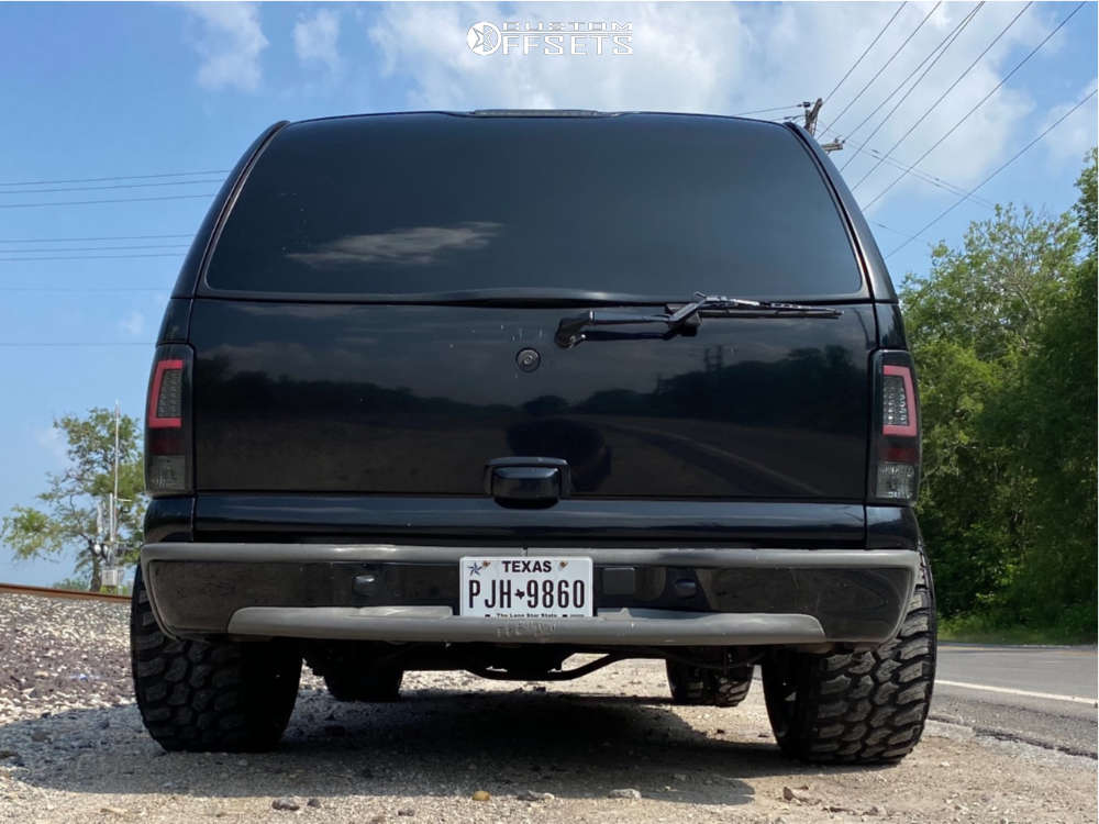 2003 Chevrolet Tahoe with 24x14 -76 TIS 544MB and 33/12.5R24 Suretrac ...