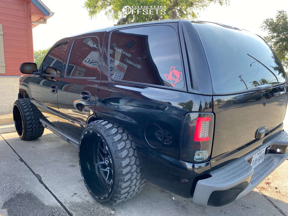 2003 Chevrolet Tahoe with 24x14 -76 TIS 544MB and 33/12.5R24 Suretrac ...