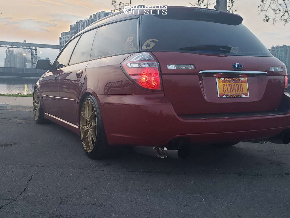 Maroon Subaru Legacy Wheels Gold