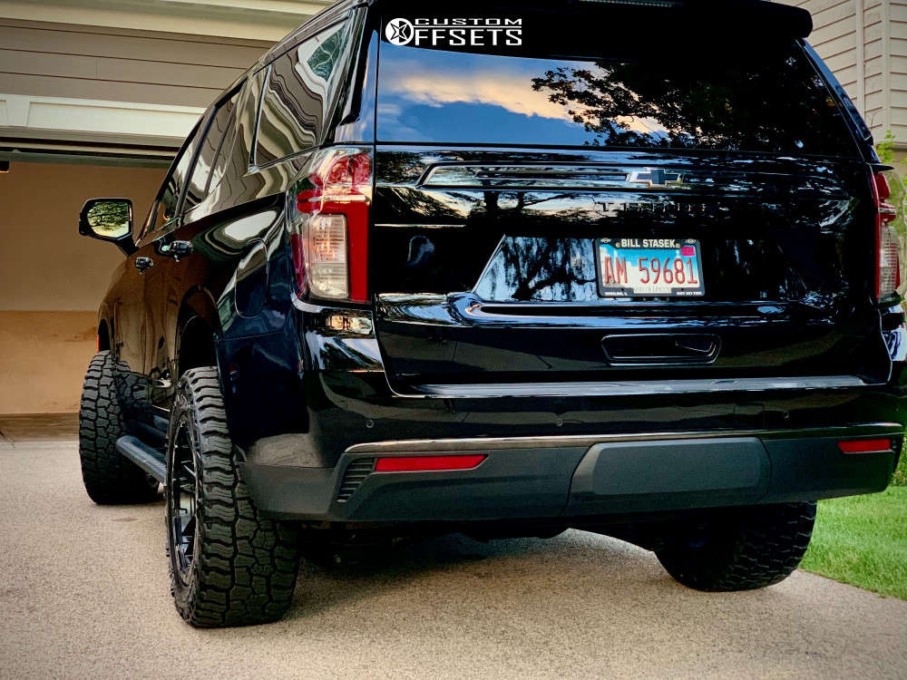 2021 Chevrolet Tahoe with 20x10 -18 Fuel Rebel and 33/12.5R20 Mickey ...
