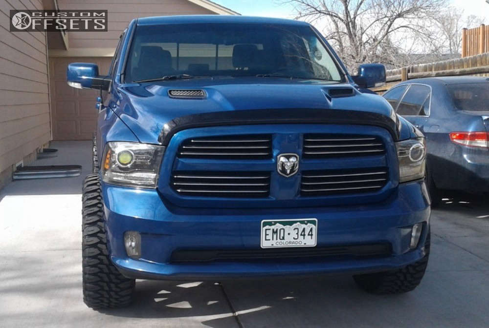 2014 Ram 1500 with 24x11 -45 Tuff T12 and 35/12.5R24 Mile King Mk868 ...