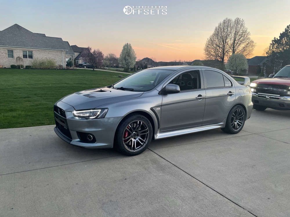 2014 Mitsubishi Lancer with 18x9.5 30 Enkei Tsp6 and 265/40R18 Michelin ...