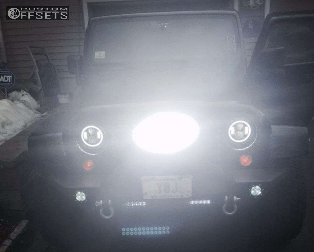 2012 Jeep Wrangler with 18x9 18 Monster Energy 642B and 325/60R18 Nitto ...