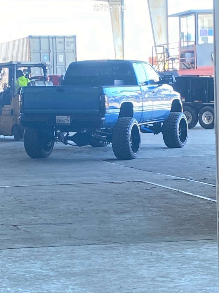 2002 Dodge Ram 2500 with 24x14 -76 Hostile Rage and 35/13.5R24 AMP ...