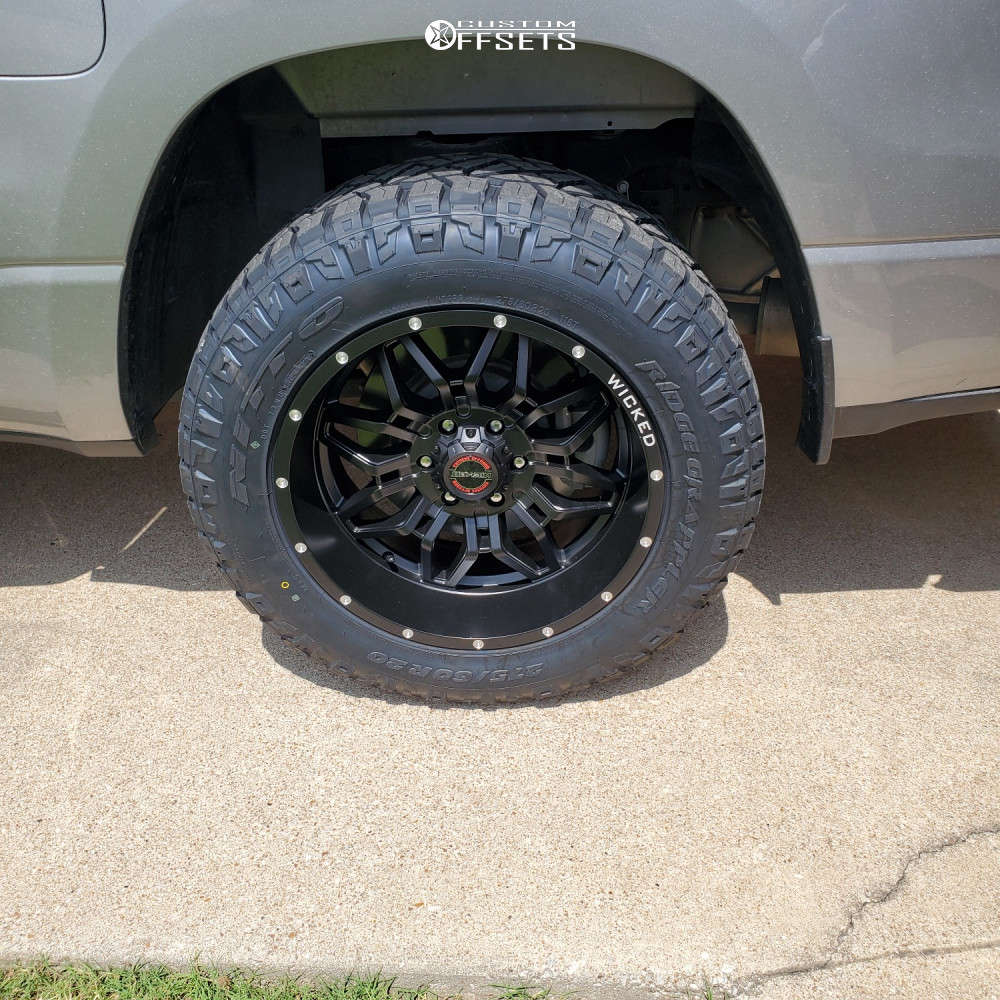 2020 Ram 1500 with 20x10 -19 Wicked Offroad W909 and 265/20R20 Nitto ...
