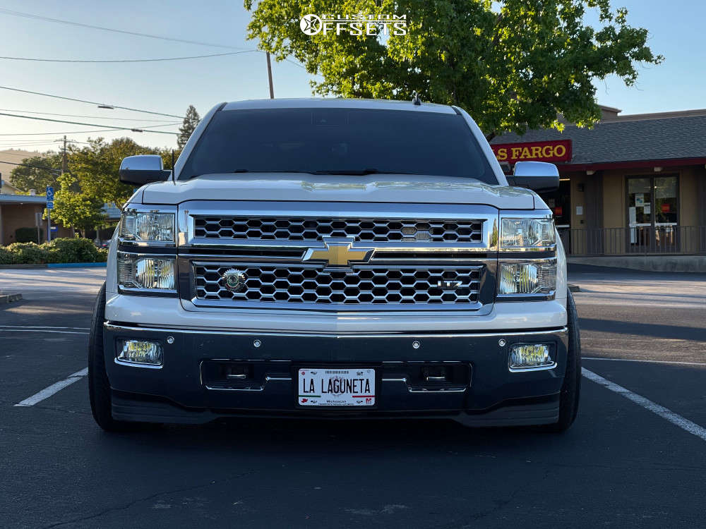 2014 Chevrolet Silverado 1500 with 20x12 -44 Vision Widow and 275/45R20 ...