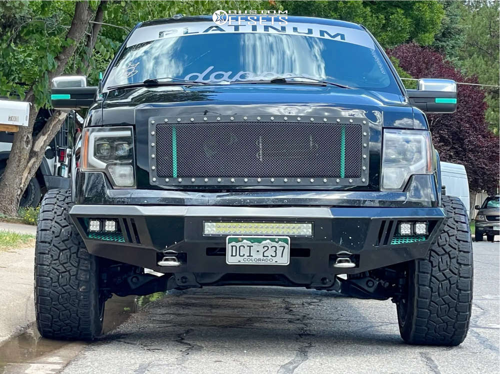 2009 Ford F-150 with 22x12 -44 American Truxx Dna and 33/12.5R22 Toyo ...