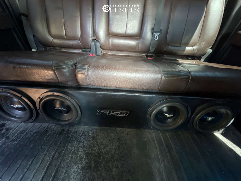 2009 Ford F-150 with 22x12 -44 American Truxx Dna and 33/12.5R22 Toyo ...