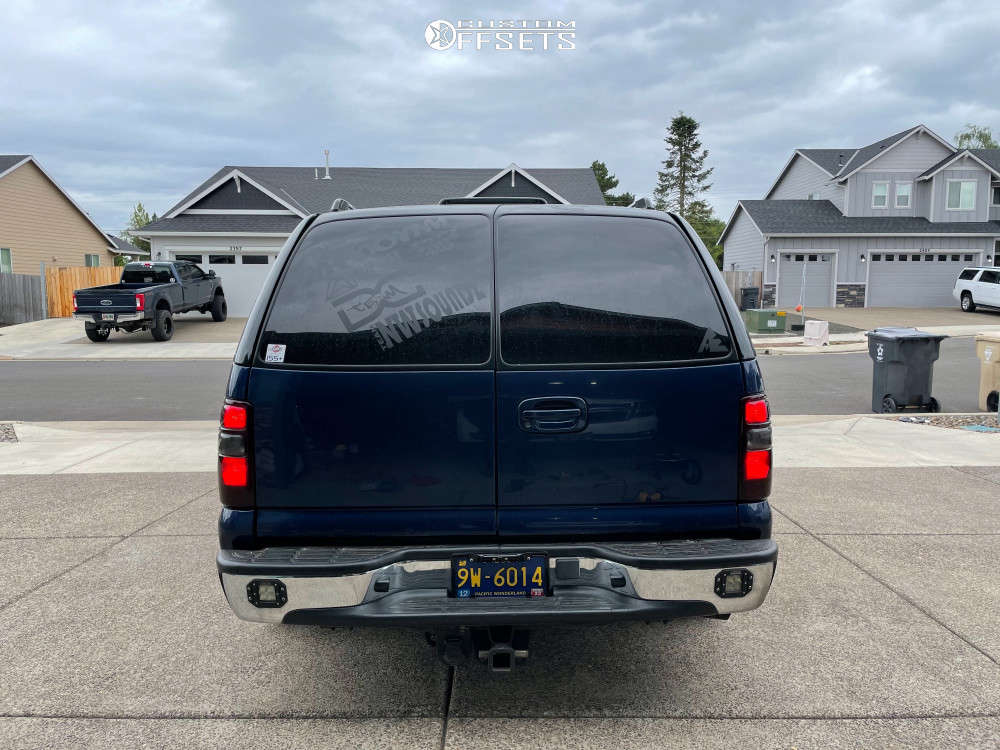 2001 Chevrolet Tahoe with 22x9 15 KMC Km704 and 275/40R22 Nitto Nt420v ...