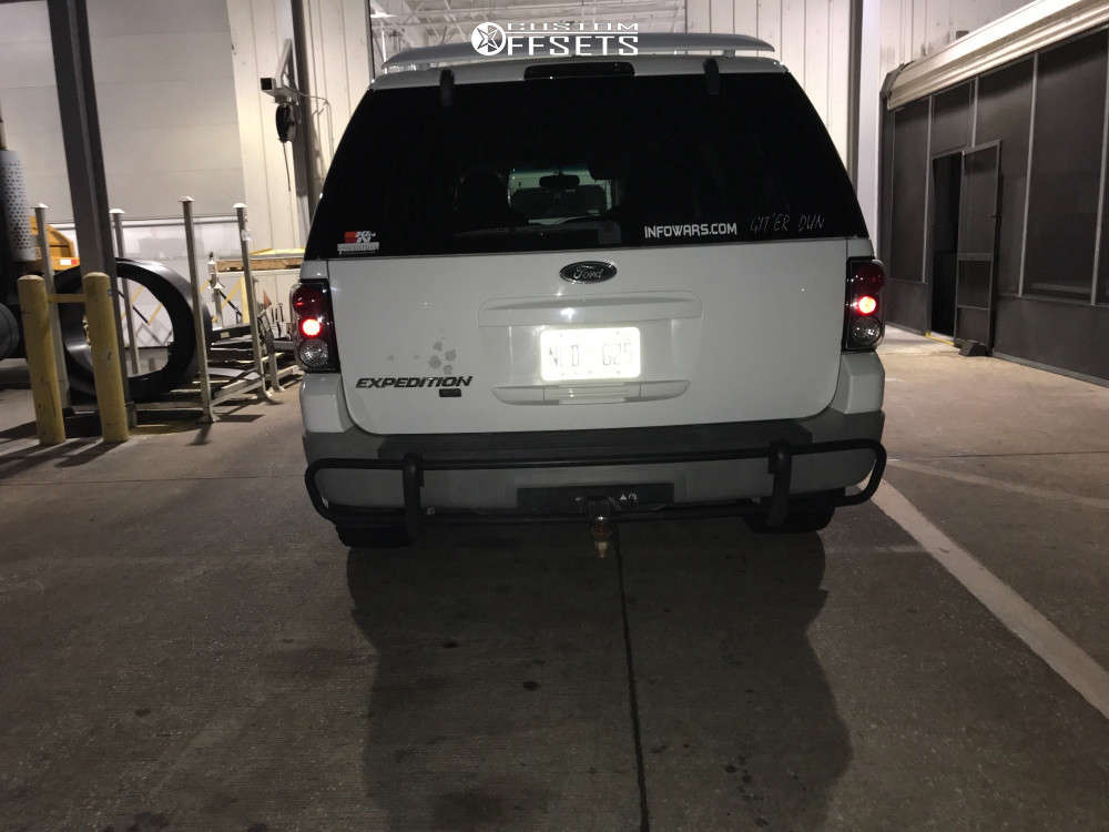 2003 Ford Expedition with 20x9 18 XD Addict and 33/12.5R20 Venom Power ...