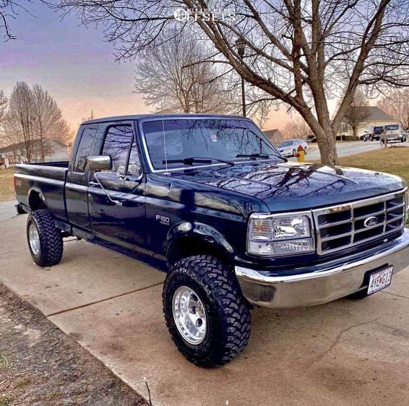 1995 Ford F-150 with 15x10 -72 Pro Comp 69 and 32/11.5R15 RBP Repulsor ...