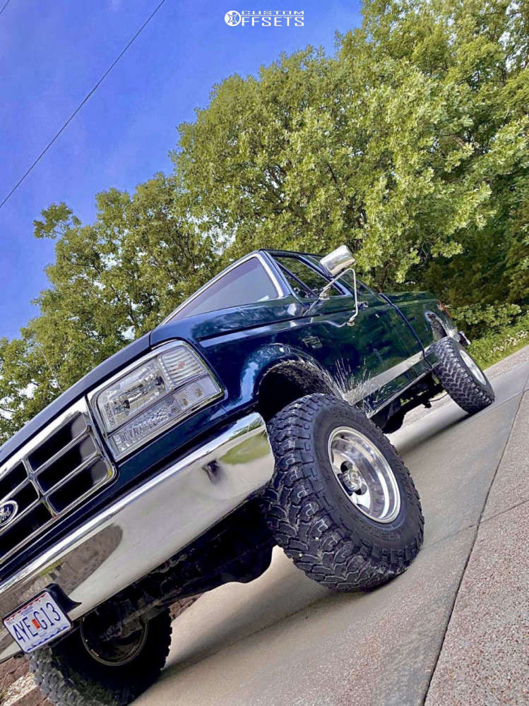 1995 Ford F-150 with 15x10 -72 Pro Comp 69 and 32/11.5R15 RBP Repulsor ...