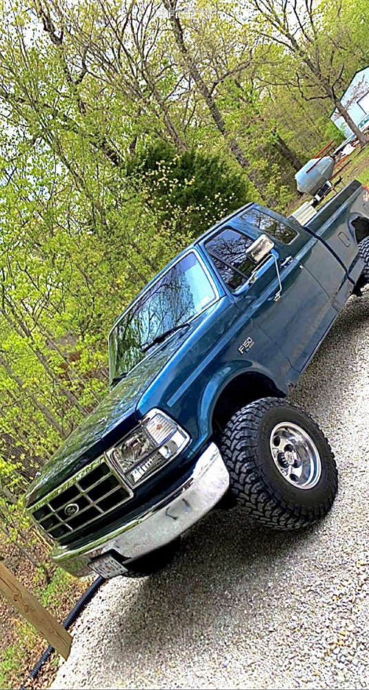 1995 Ford F-150 with 15x10 -72 Pro Comp 69 and 32/11.5R15 RBP Repulsor ...