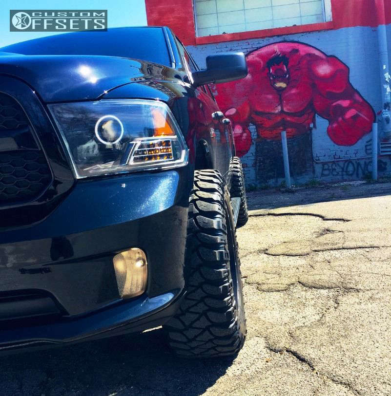 2013 Ram 1500 with 20x10 -24 Fuel Throttle and 35/12.5R20 Mickey ...