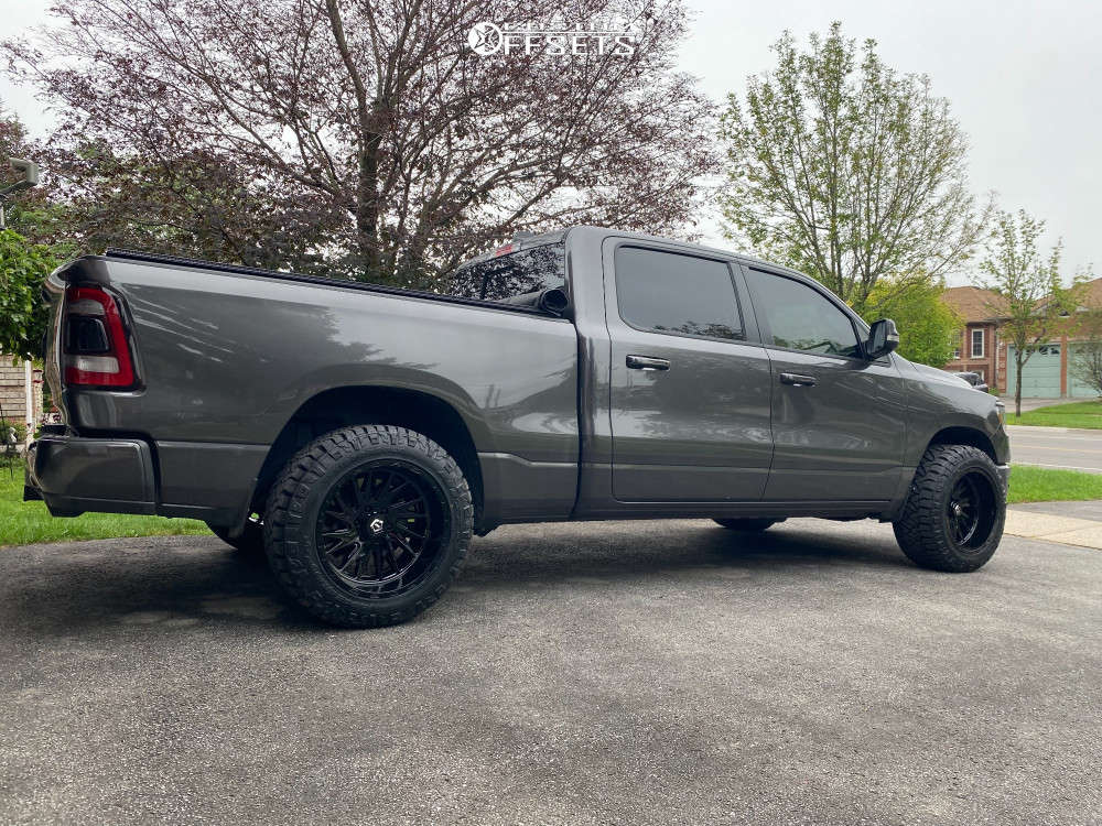 2020 Ram 1500 with 20x12 -44 TIS 547B and 33/12.5R20 Nitto Ridge ...