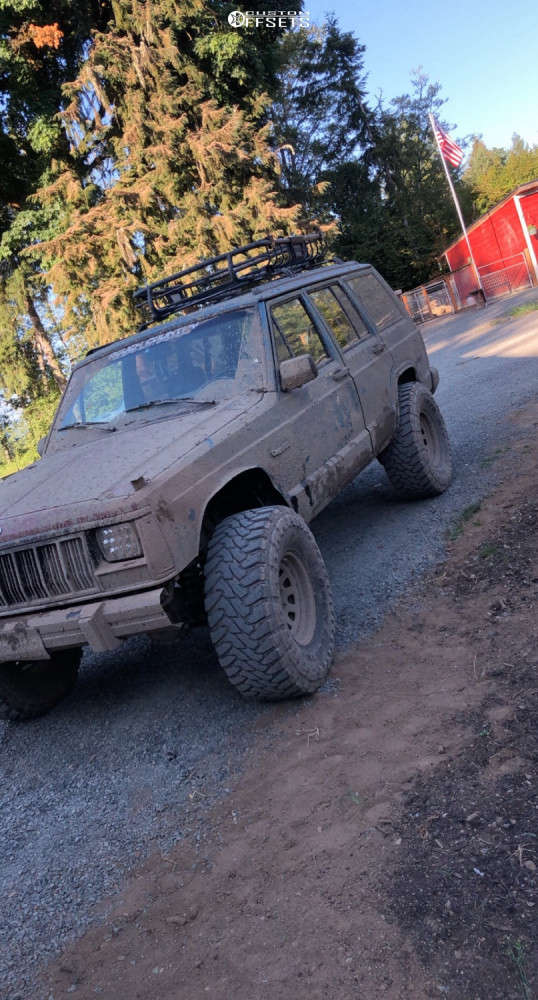 1994 Jeep Cherokee with 15x12 -44 Pro Comp Custom and 33/12.5R15 Toyo ...