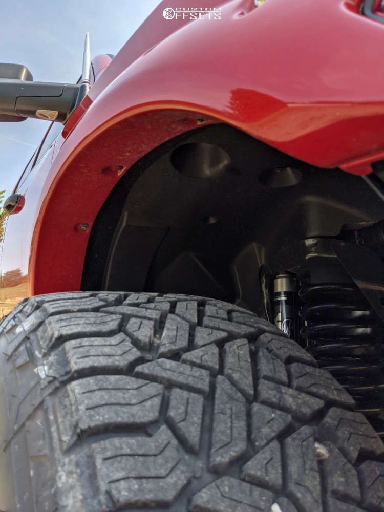 2017 Ram 2500 with 22x14 -76 Hostile Alpha and 325/50R22 Fuel Gripper A ...