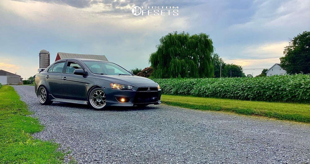 2011 Mitsubishi Lancer with 18x8.5 35 Aodhan Ds01 and 245/40R18 Haida ...