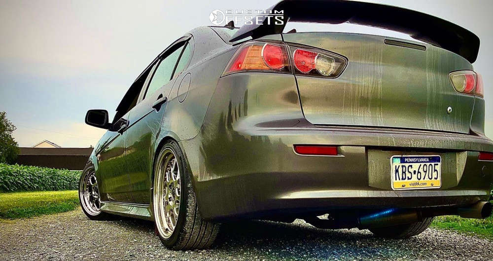 2011 Mitsubishi Lancer with 18x8.5 35 Aodhan Ds01 and 245/40R18 Haida ...