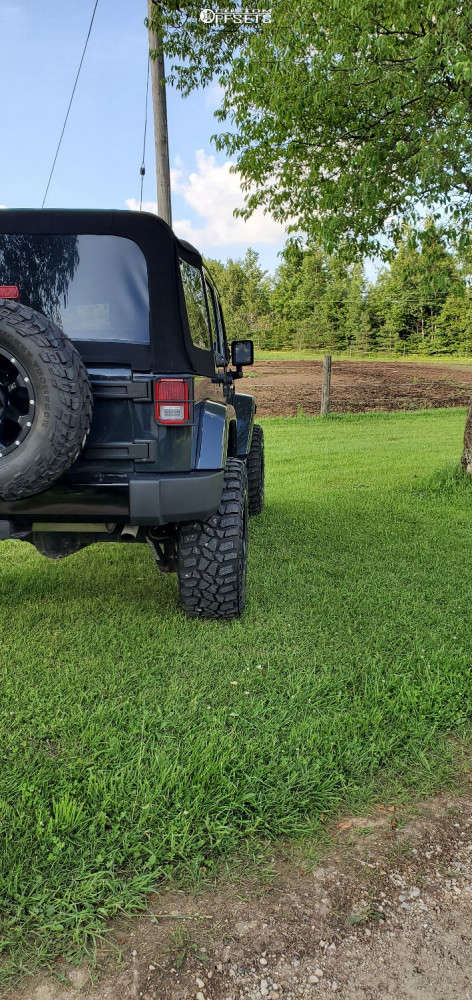 2018 Jeep Wrangler JK with 20x9 -18 Krank Hammer and 35/12.5R20 Cooper ...