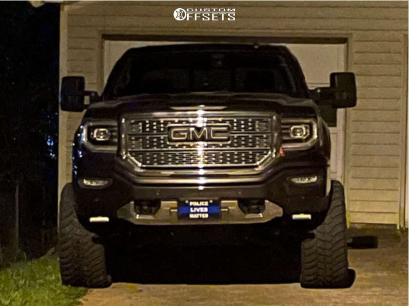 2016 GMC Sierra 1500 with 24x12 -44 Vision Rocker 412 and 35/13.5R24 ...