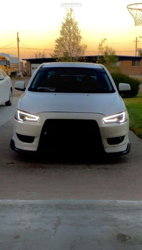 2010 Mitsubishi Lancer with 18x9.5 22 ESR Sr01 and 235/35R18 Nitto Neo ...