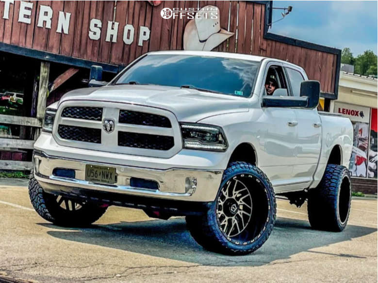 2015 Ram 1500 with 24x14 -76 TIS 544MB and 35/14.5R24 Venom Power Terra ...