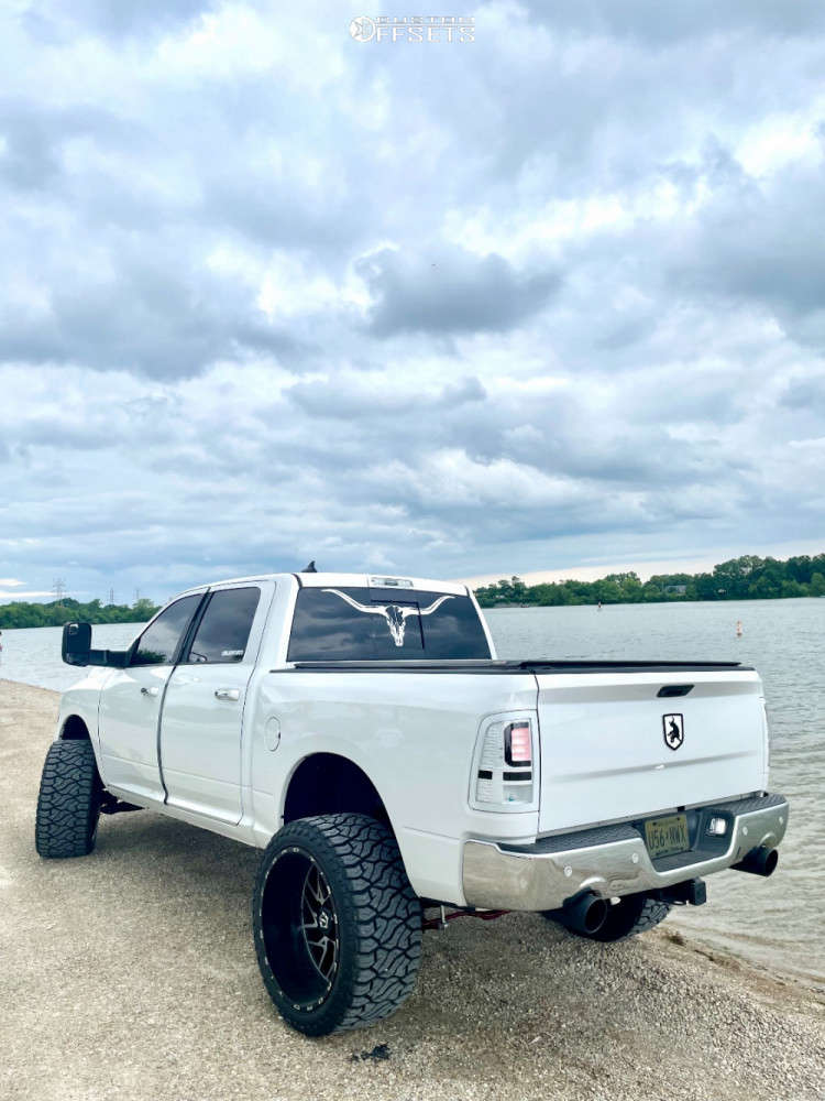 2015 Ram 1500 with 24x14 -76 TIS 544MB and 35/14.5R24 Venom Power Terra ...