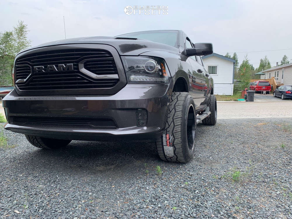 2018 Ram 1500 with 20x12 -44 TIS 544BM and 305/50R20 Nitto NT420V and ...