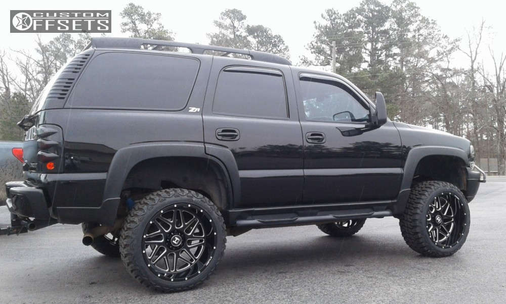 2004 Chevrolet Tahoe with 22x12 -44 Hostile Sprocket and 33/12.5R22 ...