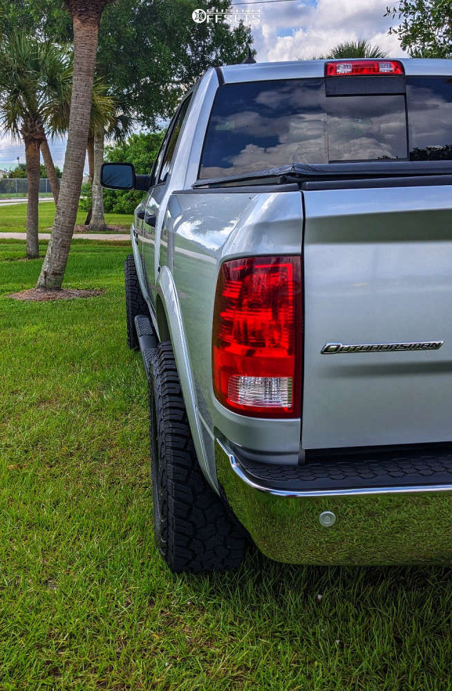 2016 Ram 1500 with 18x10 -44 Black Rhino Raze and 295/70R18 Yokohama ...