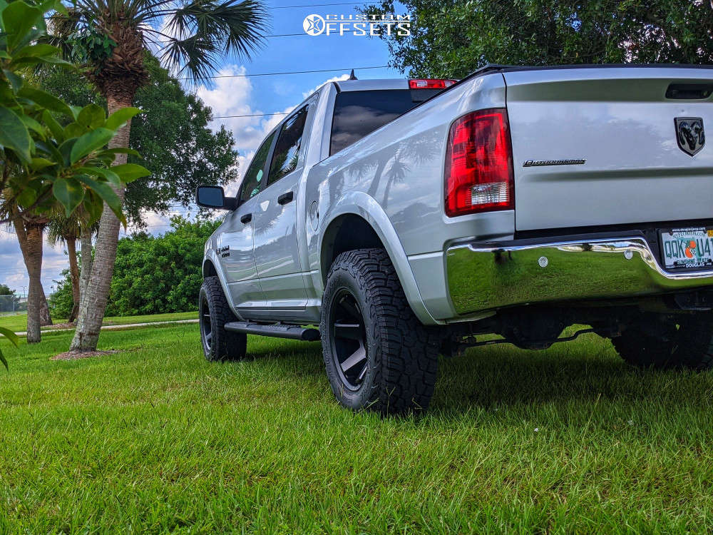 2016 Ram 1500 with 18x10 -44 Black Rhino Raze and 295/70R18 Yokohama ...