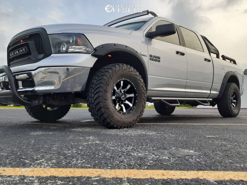 2017 Ram 1500 with 17x9 -12 Moto Metal Mo970 and 35/12.5R17 AMP Mud ...
