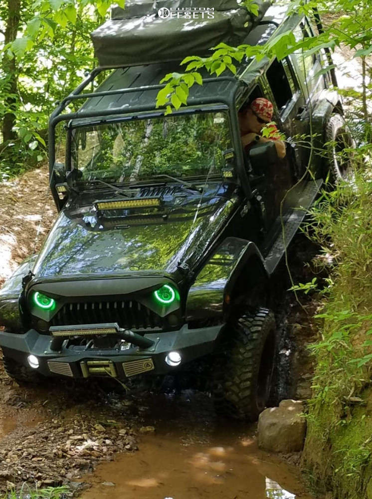 2012 Jeep Wrangler with 17x9 0 Fuel Battle Axe and 37/12.5R17 Firestone Destination Mt2 and ...