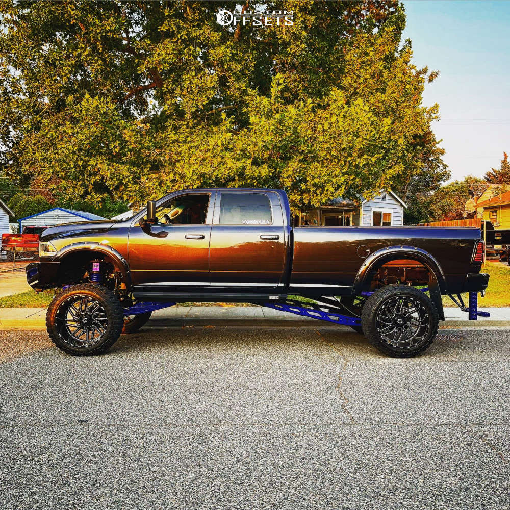 2010 Dodge Ram 2500 with 26x14 -76 TIS 544BM and 40/15.5R26 Fury ...