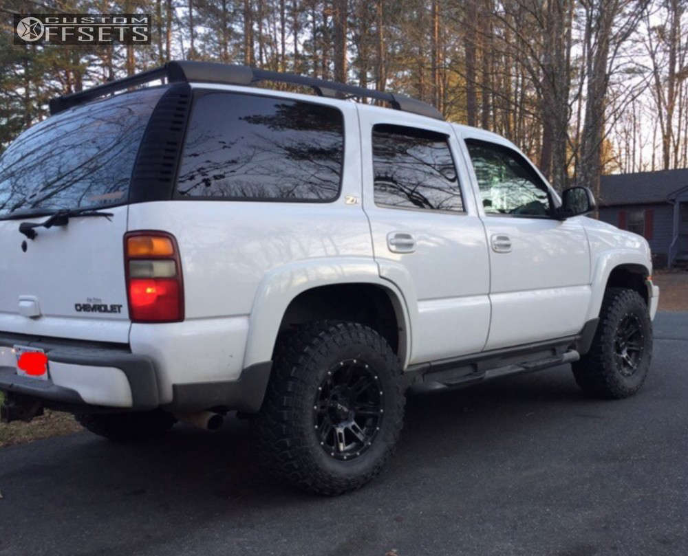 2003 Chevrolet Tahoe with 20x9 0 Helo He900 and 33/12.5R20 Continental ...