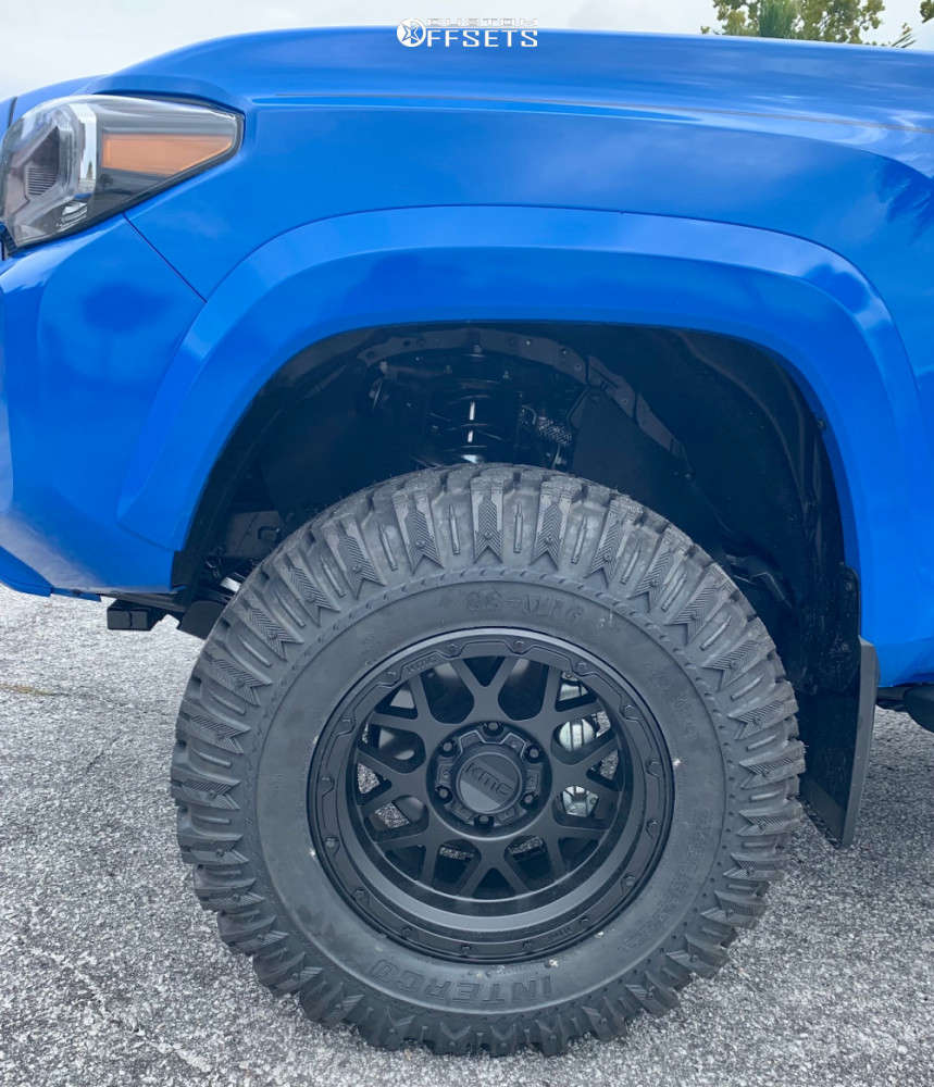 2021 Toyota Tacoma with 17x9 -12 KMC Km535 and 33/10.5R17 Super Swamper ...