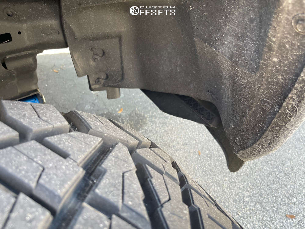 2019 Ram 1500 with 24x12 -44 Fuel Runner and 37/13.5R24 Nitto Ridge ...