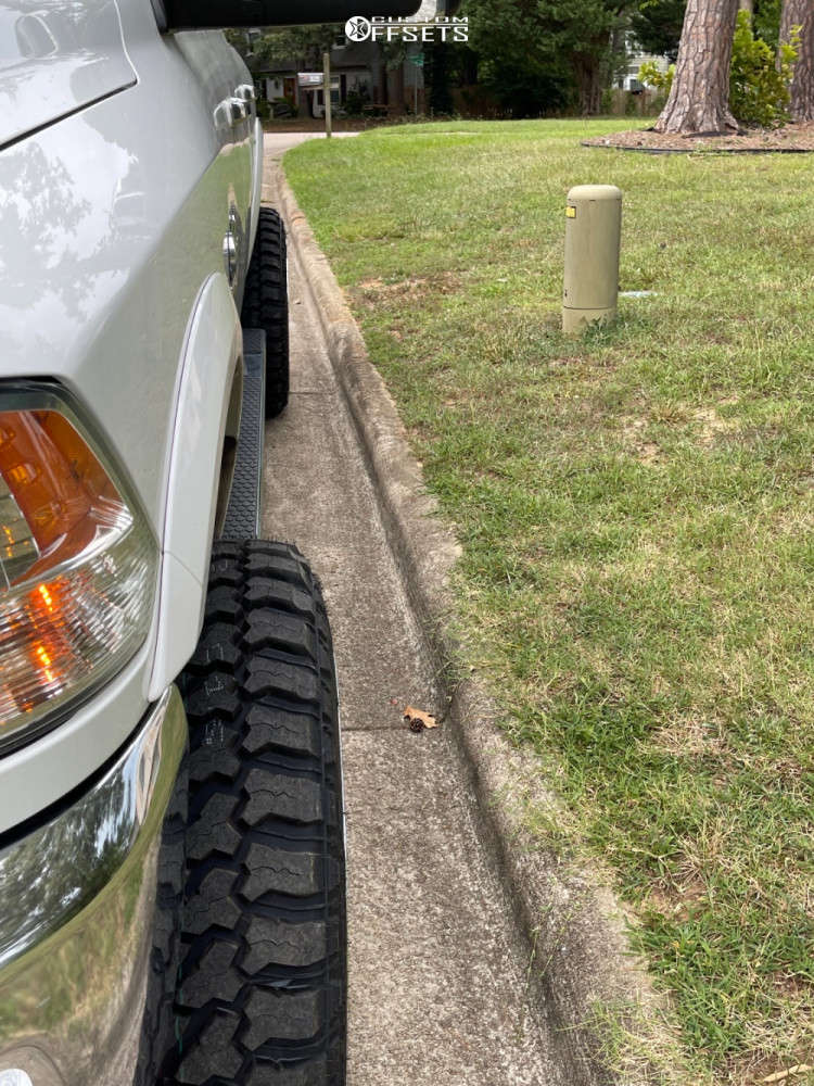 2018 Ram 2500 with 24x12 -51 Vision Rocker 412 and 35/12.5R24 Fury ...