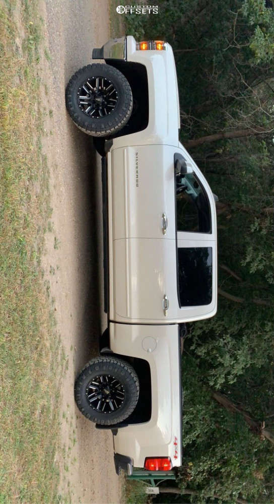 2015 Chevrolet Silverado 1500 with 18x10 -4 Moto Metal Mo978 and 33/12 ...