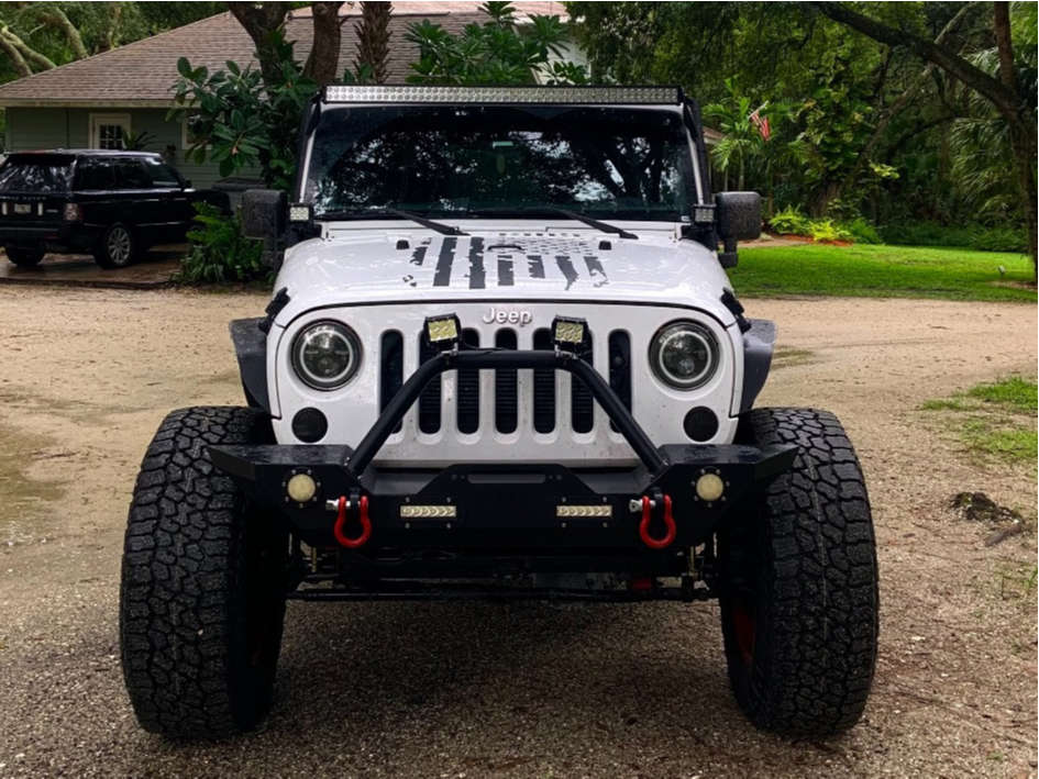 2017 Jeep Wrangler JK with 20x10 6.35 XD Xd859 and 37/12.5R20 Falken ...