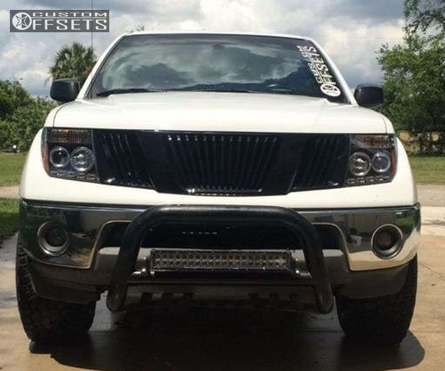 2006 Nissan Frontier with 16x8 18 MB Wheels TKO and 285/75R16 Cooper ...