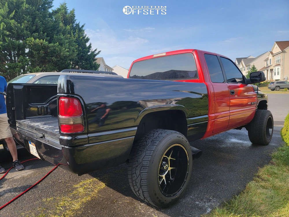 2002 Dodge Ram 2500 with 20x12 -51 Vision Sliver and 305/50R20 Nitto ...