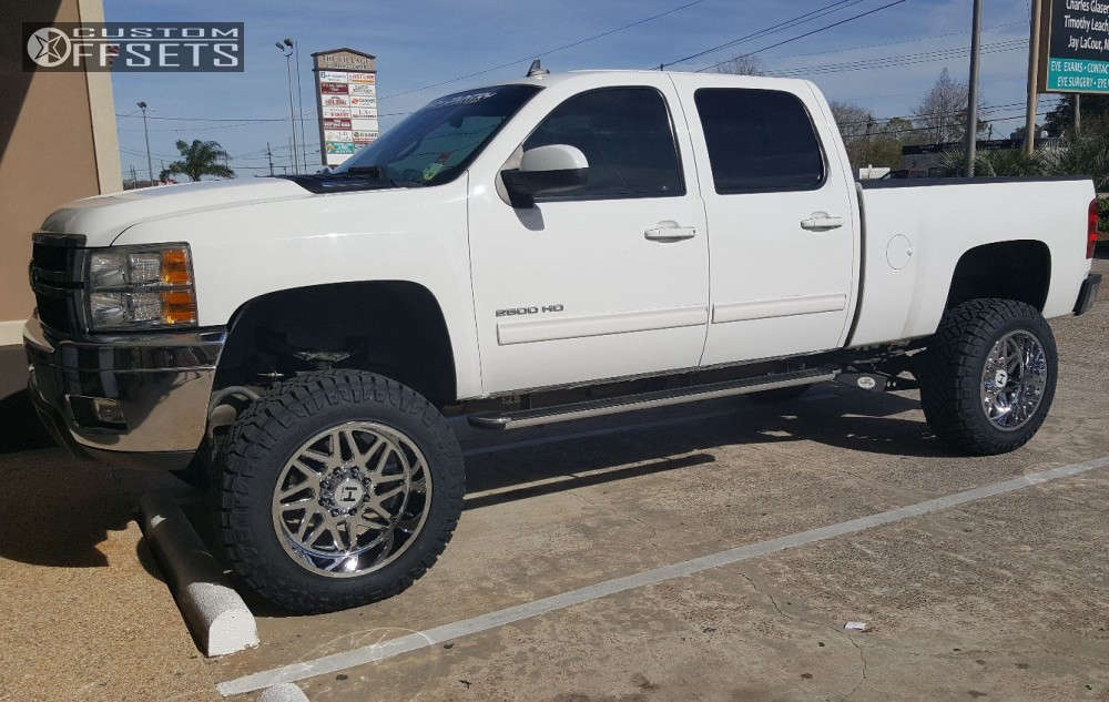 2011 Chevrolet Silverado 2500 HD with 22x12 -44 Hostile Sprocket and 37/12.5R22 Nitto Ridge ...