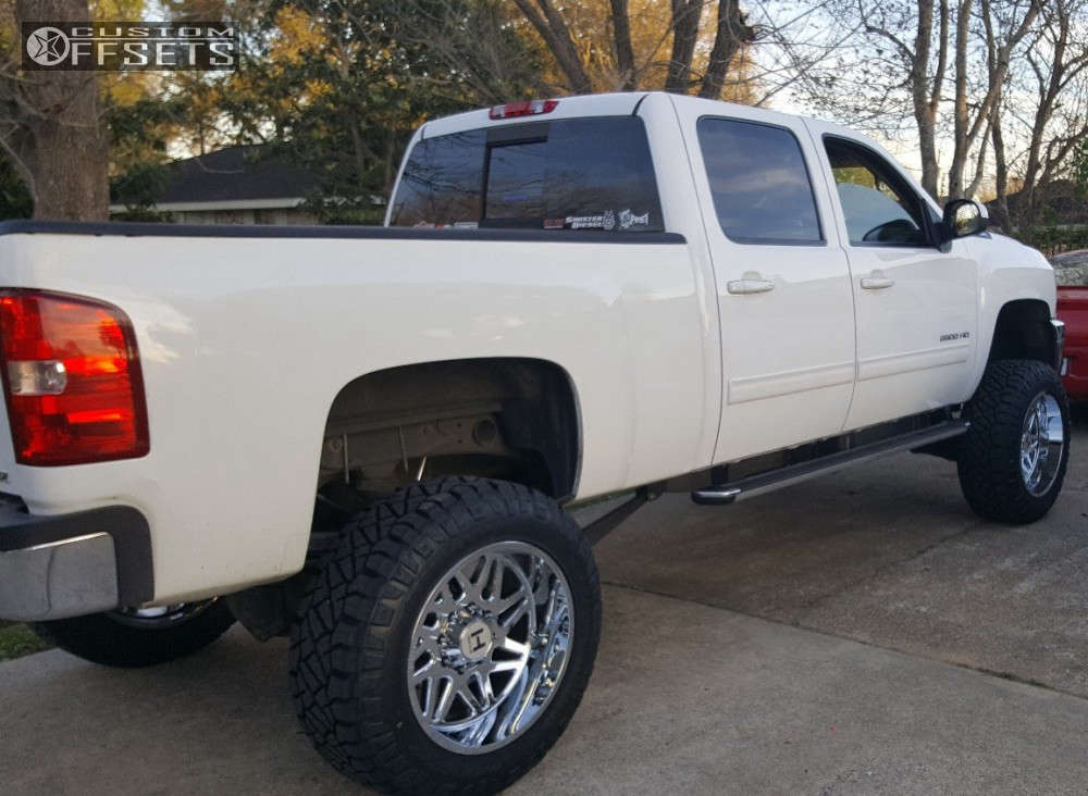 2011 Chevrolet Silverado 2500 HD with 22x12 -44 Hostile Sprocket and 37/12.5R22 Nitto Ridge ...