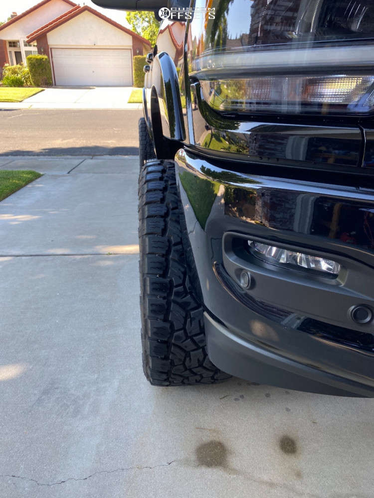 2021 Ram 2500 with 22x10 -19 TIS 547B and 35/12.5R22 Toyo Tires Open Country A/T III and ...