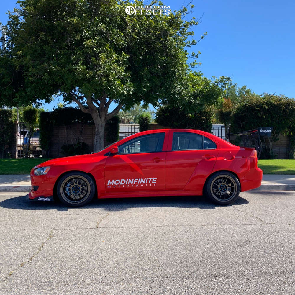 2009 Mitsubishi Lancer with 18x10.5 22 Konig Hypergram and 265/40R18 ...