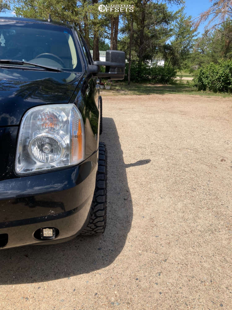 2007 GMC Yukon XL 1500 with 20x10 -25 Vision Widow and 33/12.5R20 Kenda ...