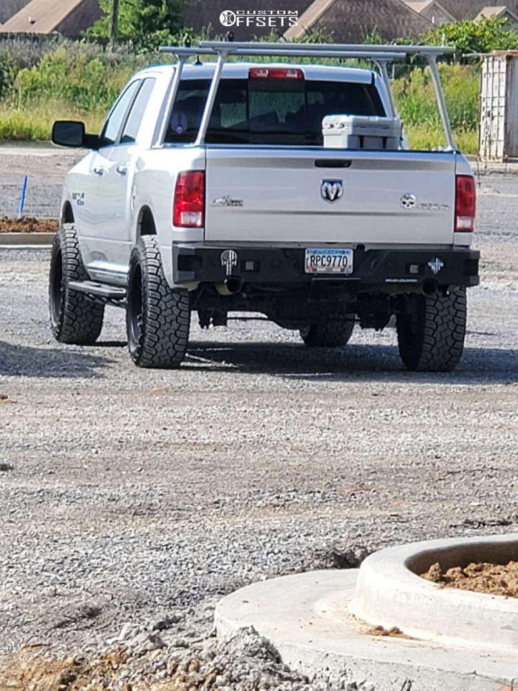 2018 Ram 1500 with 20x10 -25 Vision Razor and 35/12.5R20 Yokohama ...